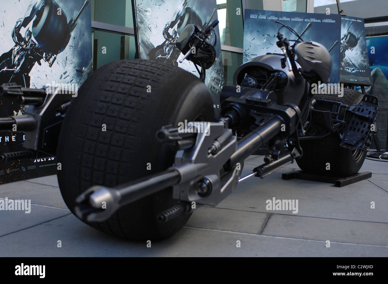 The Bat Pod and other Batman costumes on display outside the Arclight ...