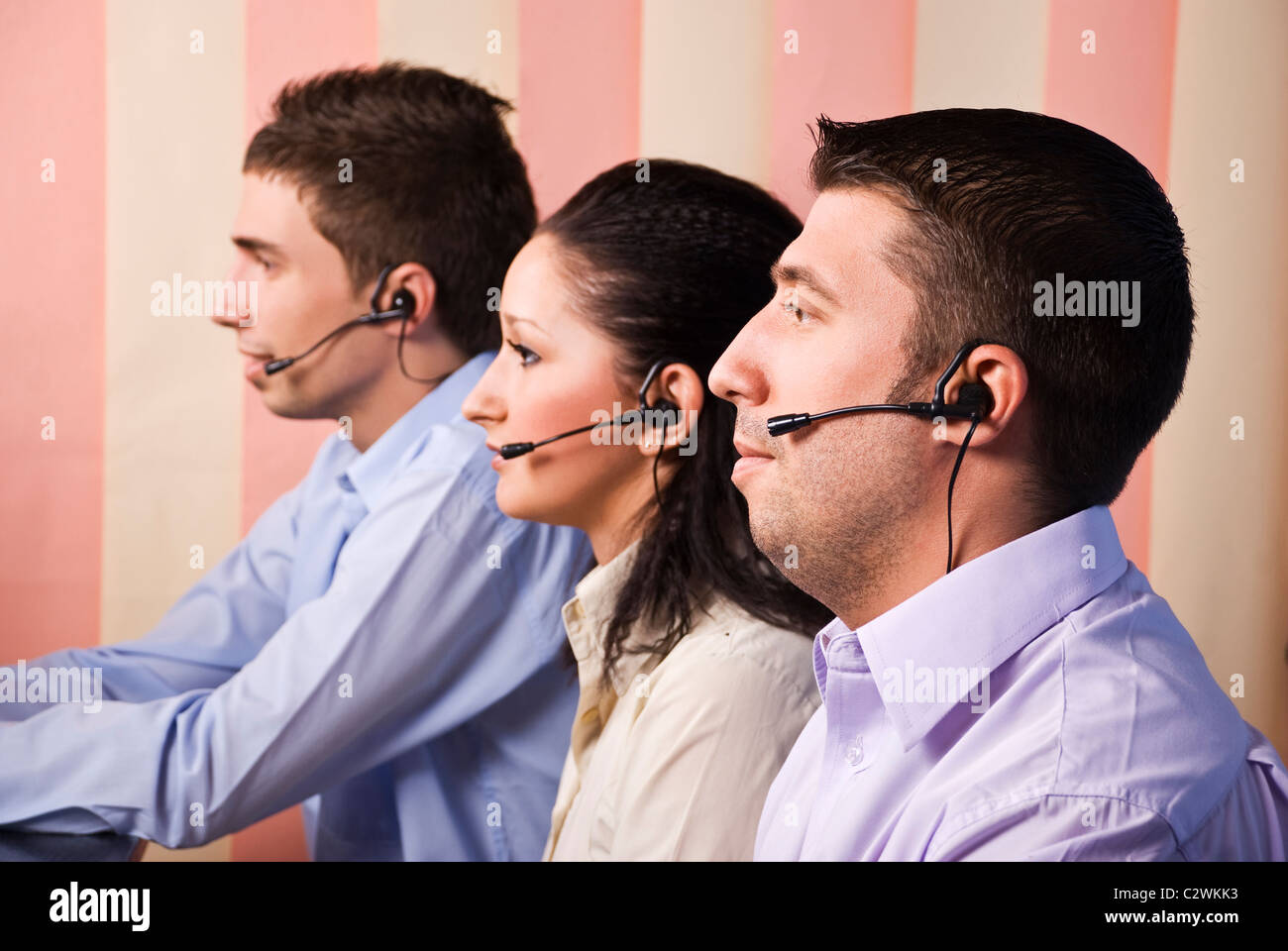 Three people customer service representative working in office ...