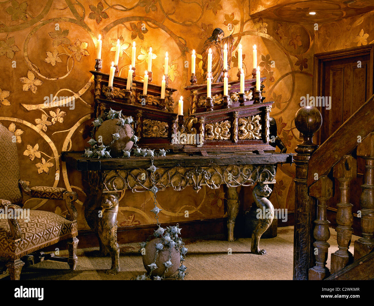 Gothic carved table candles gold walpaper Stock Photo - Alamy