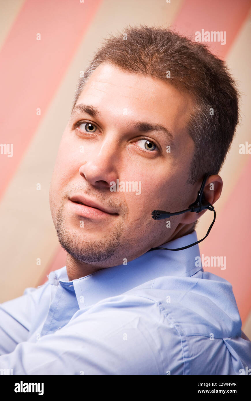 Portrait of support operator man with beard in corner smiling you Stock ...