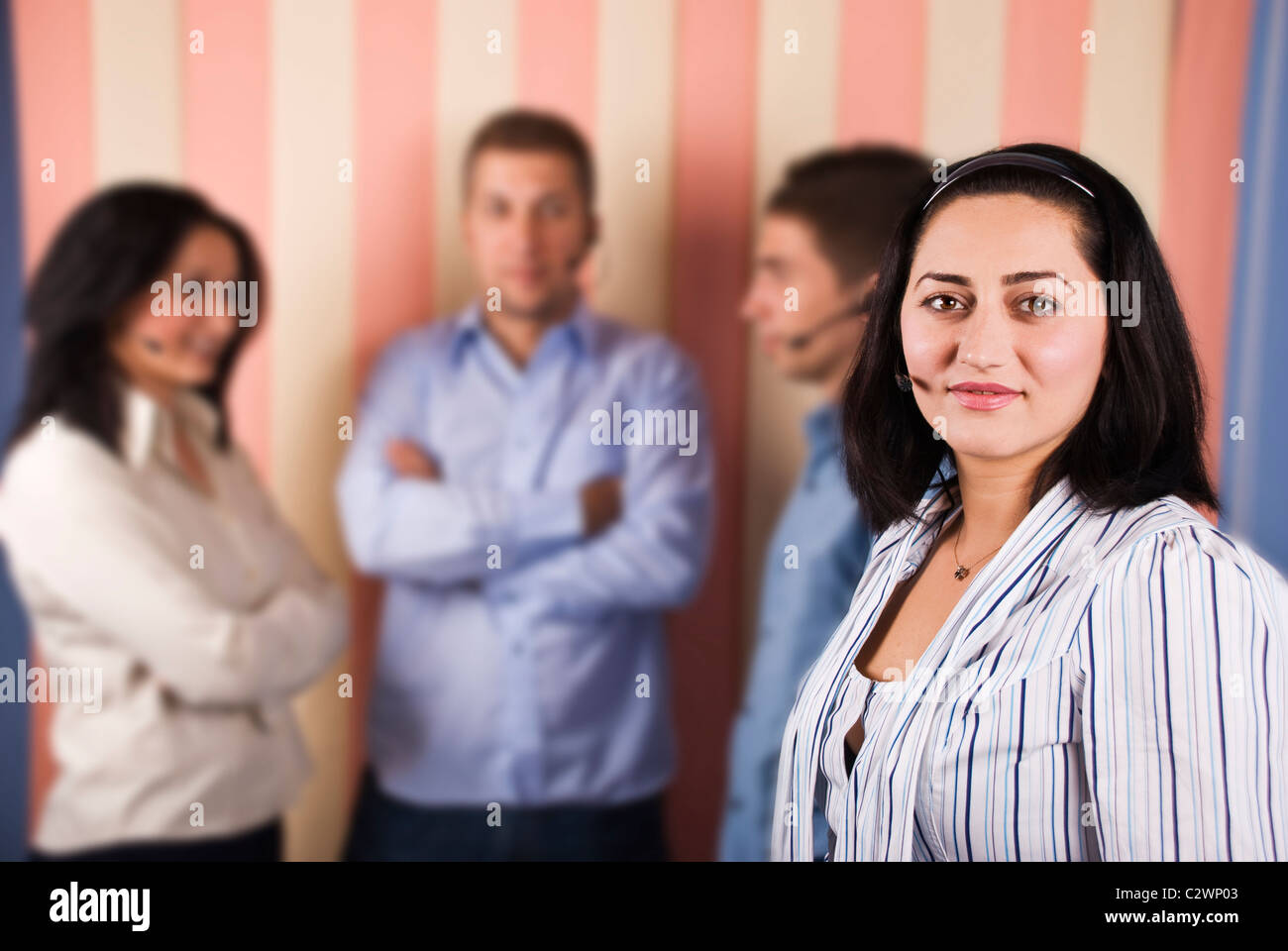 Support operator teamwork with mid female in front of image and her ...