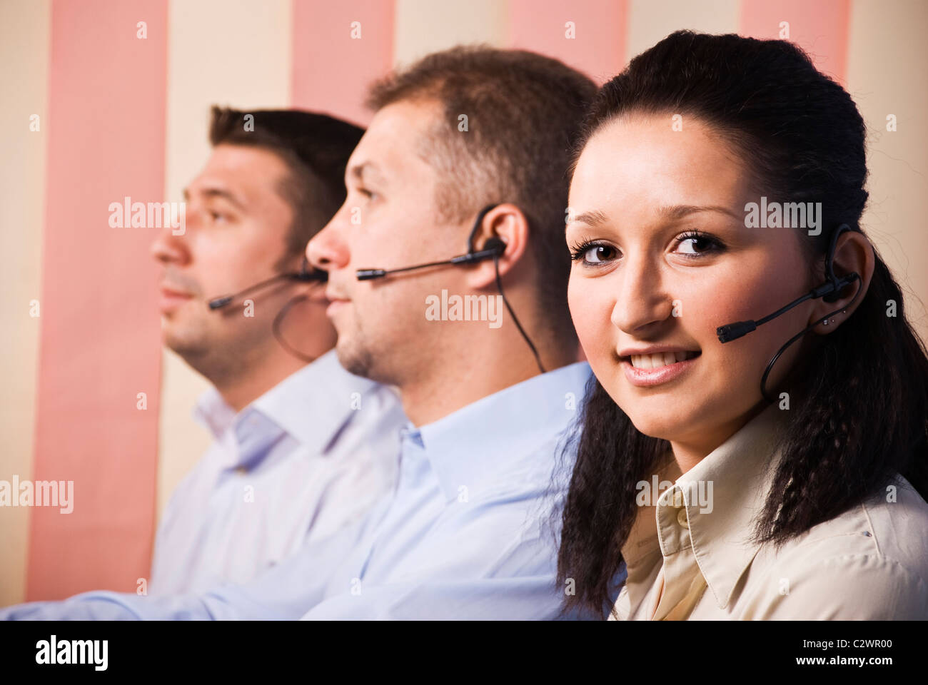 Smiling callcenter agent headset support hi-res stock photography and ...