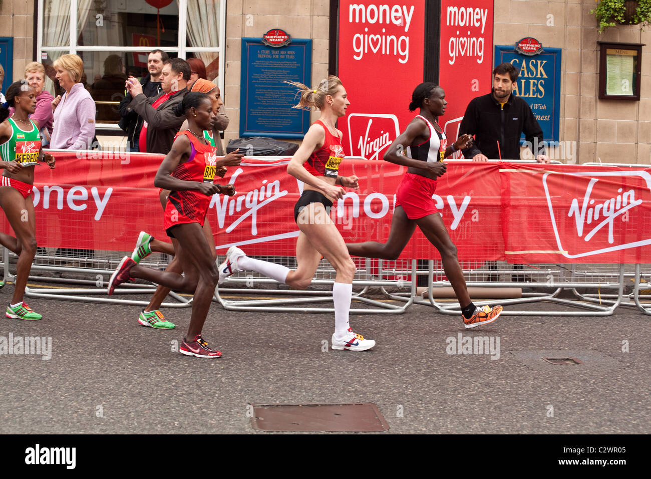 Woman elite runners at the London Marathon 2011,Church Street ...