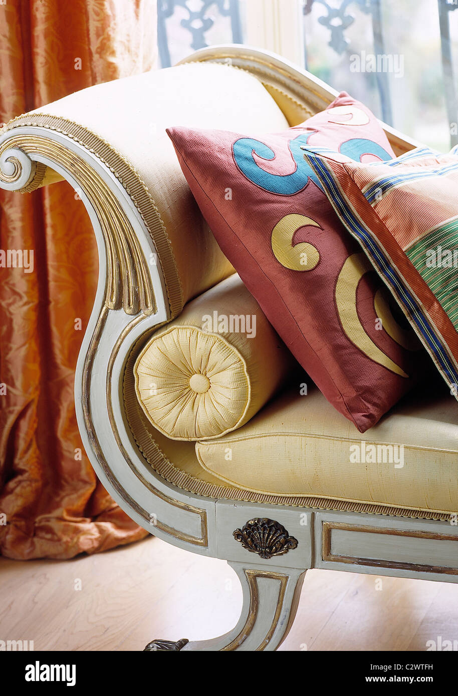 day bed, painted frame, yellow seat Stock Photo - Alamy