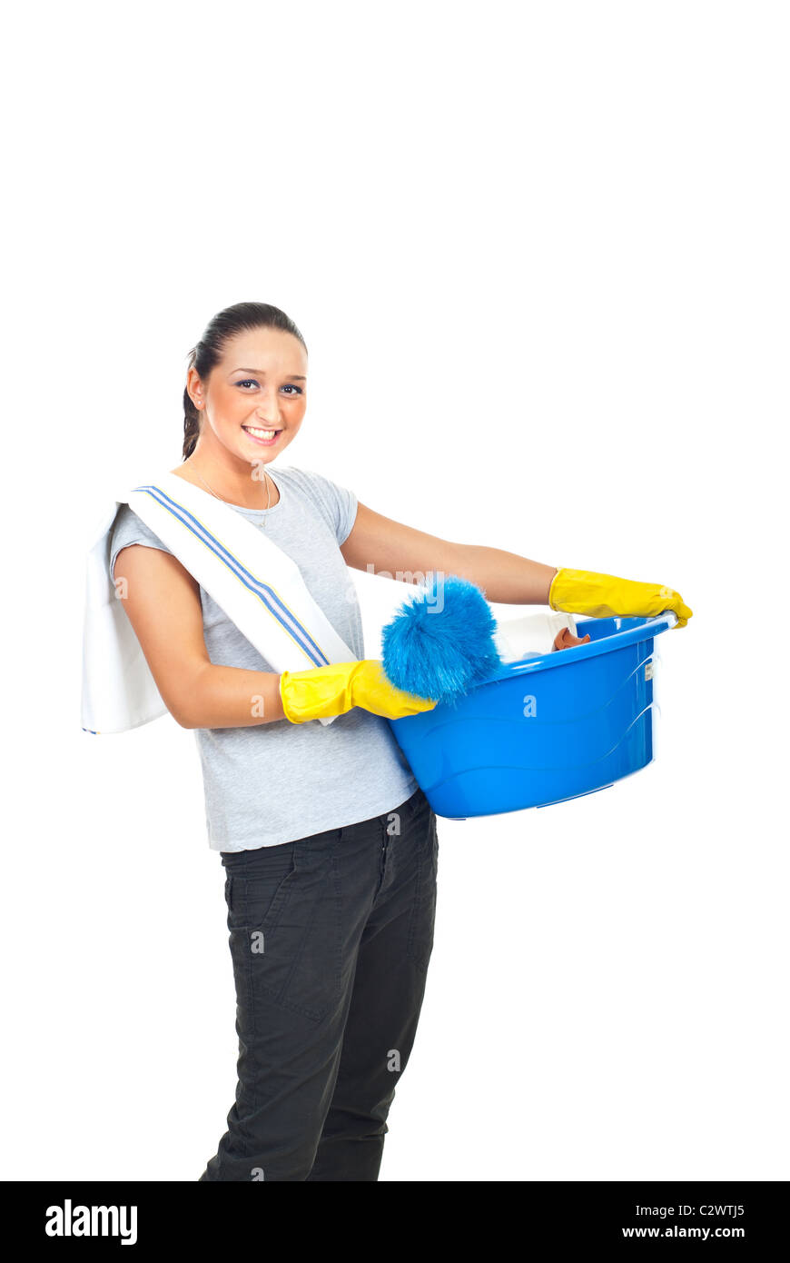 Happy housewife carrying cleaning products isolated on white background ...