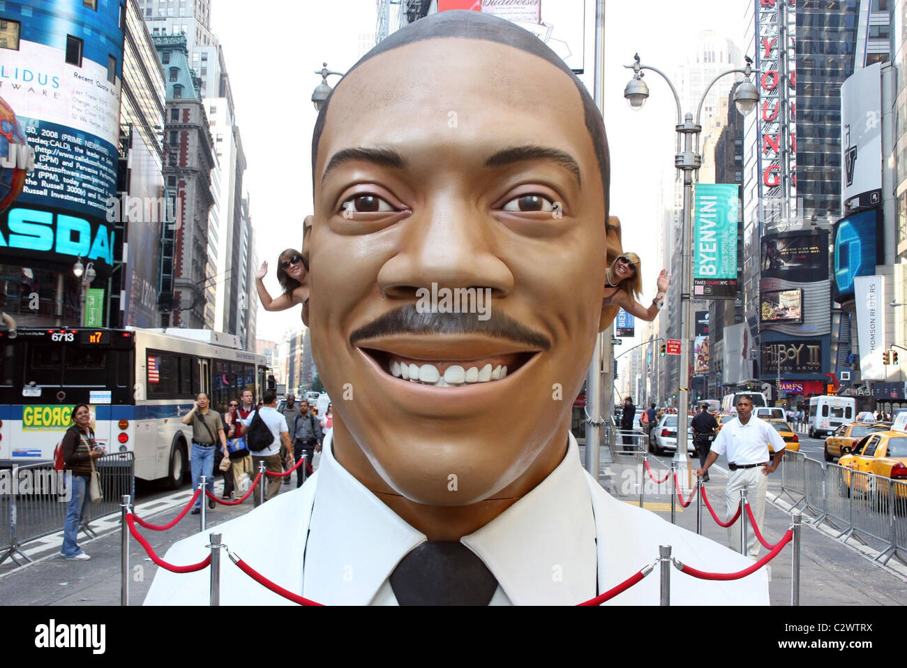 A 15 foot tall replica of Eddie Murphy's head is placed in Times Square ...
