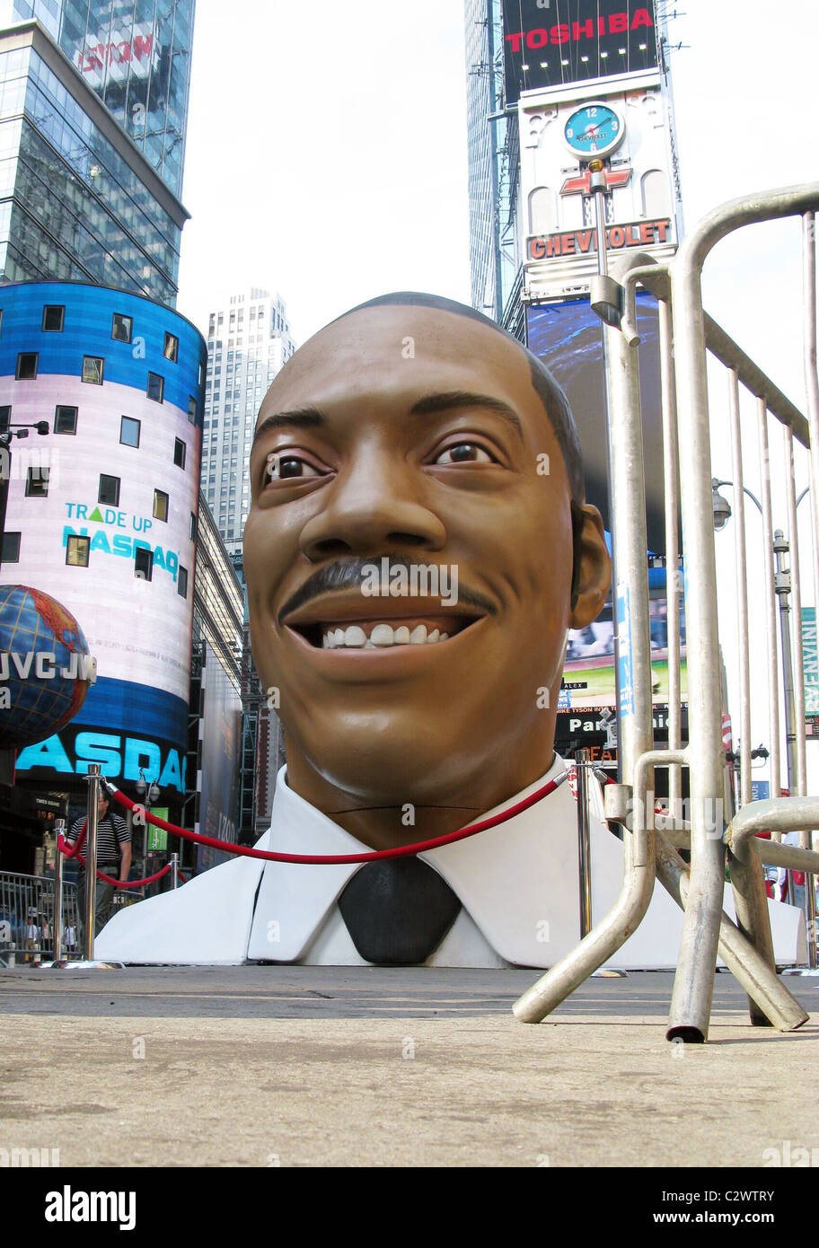 A 15 foot tall replica of Eddie Murphy's head is placed in Times Square ...