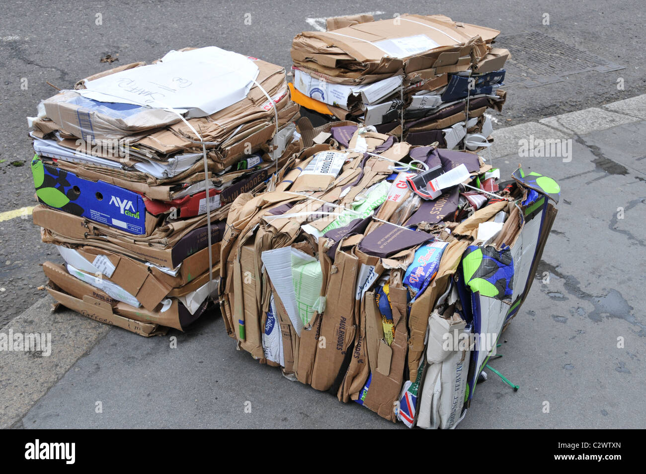 Recycled cardboard boxes street tidy packed packaging Stock Photo - Alamy
