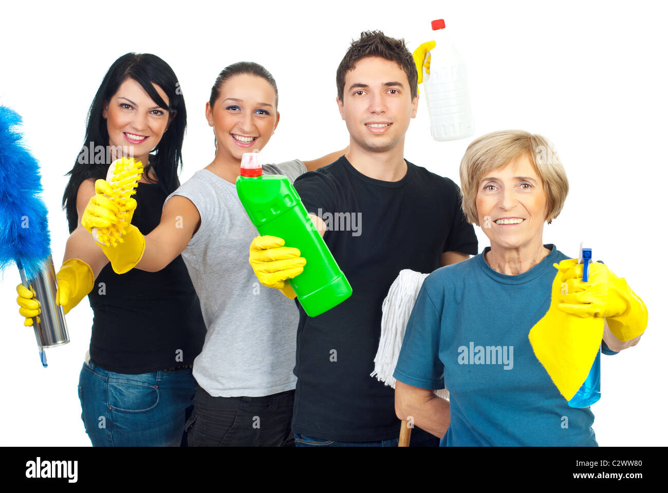 Cheerful team of cleaning service workers showing their products for ...