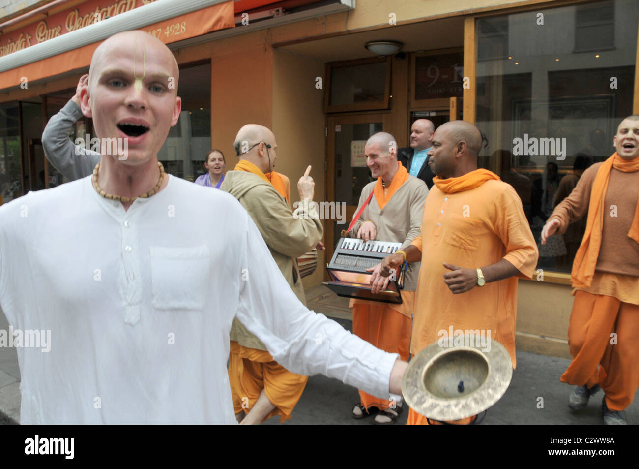 Hari Krishna monks chanting singing London passion religion belief ...