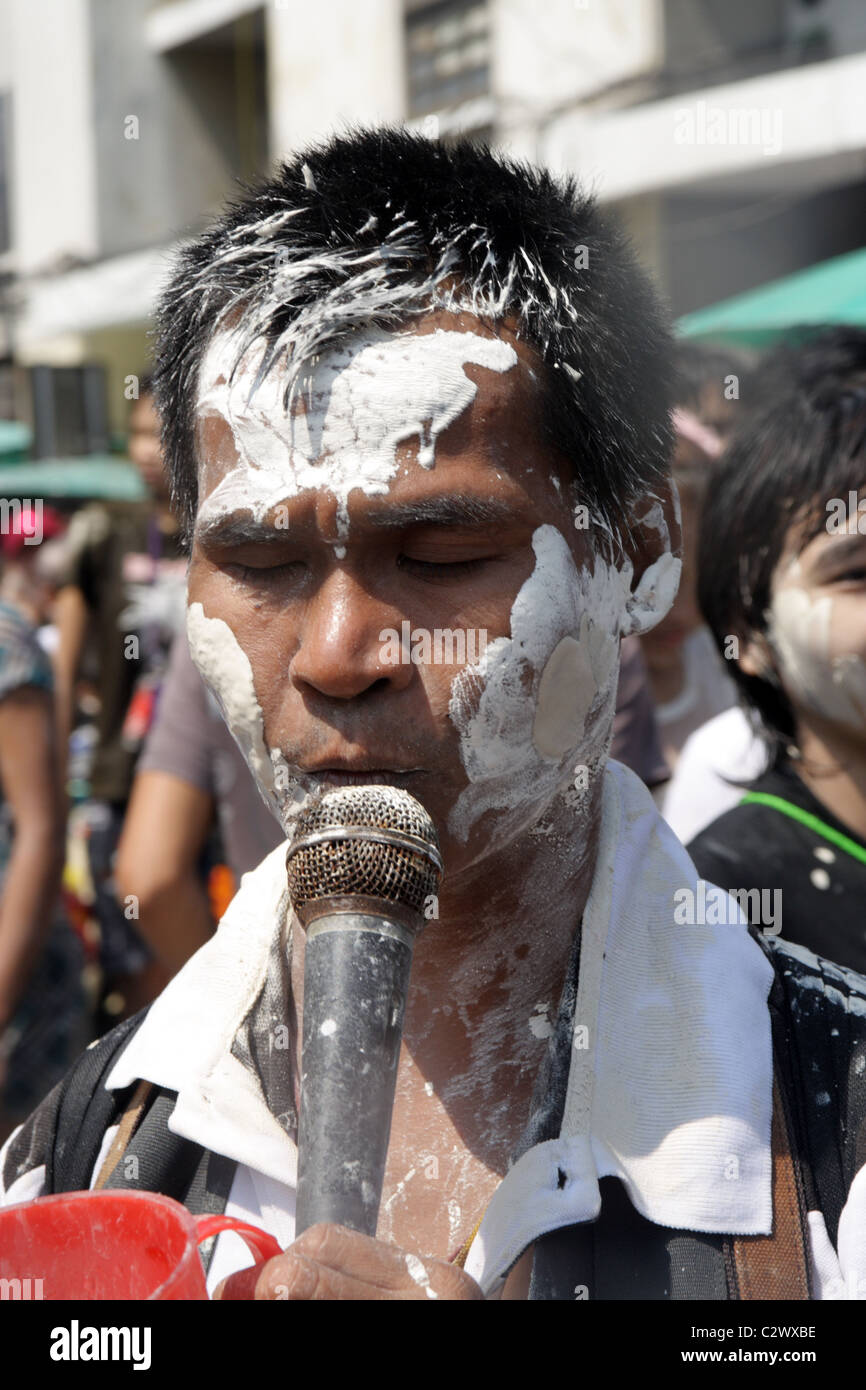 Thai man with powder on his face , Songkran New Year Festival in ...