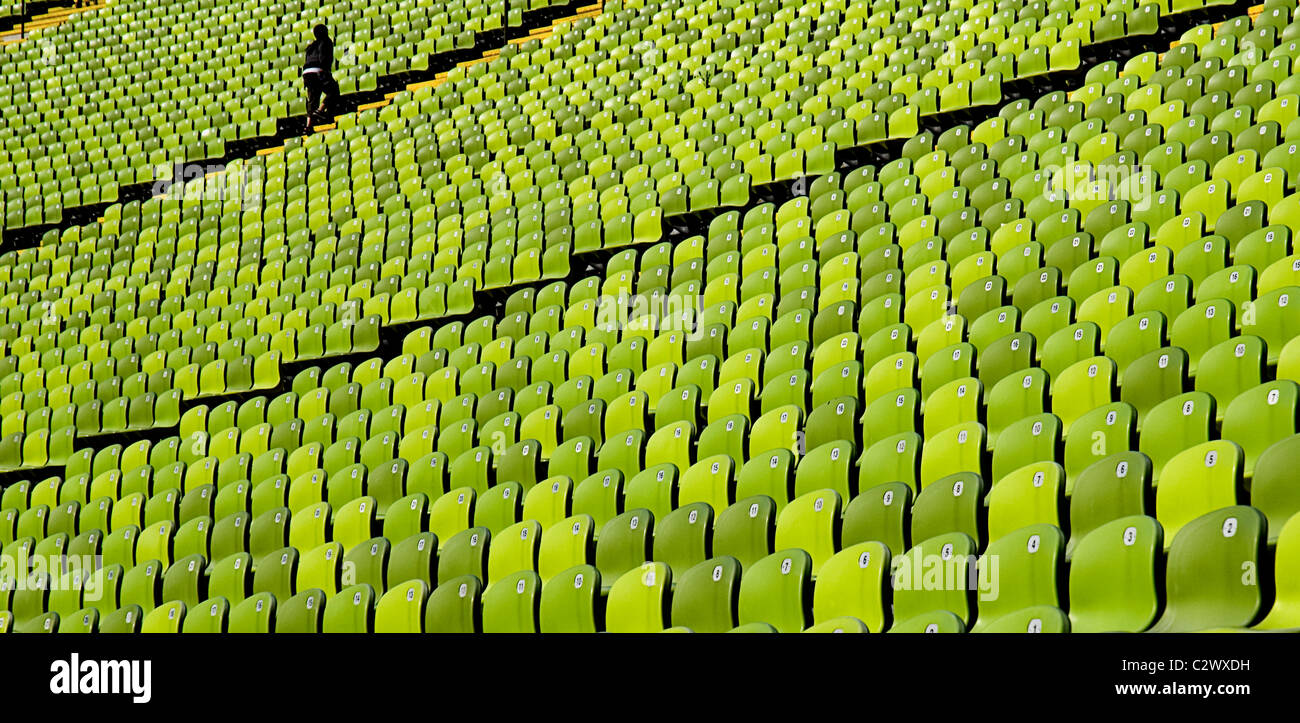 Germany Bavaria Munich Olympic Stadium curved section of bright green ...