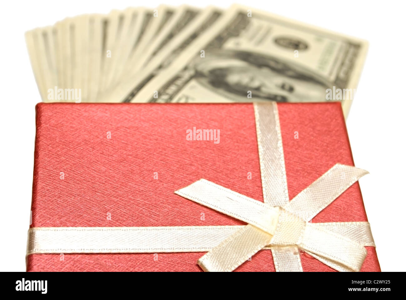 gift box and dollars on white. closeup Stock Photo - Alamy