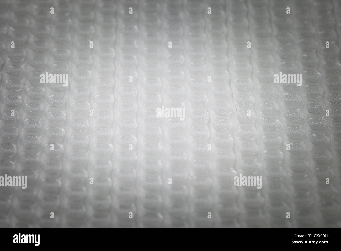 Air bubbled plastic wrapping material Stock Photo - Alamy