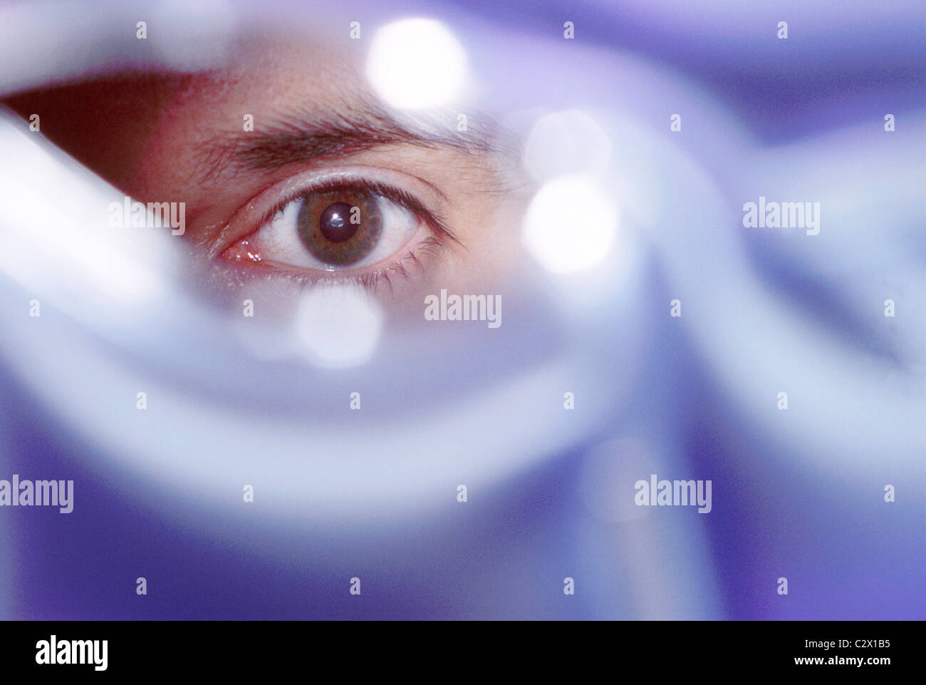 eye through mask Stock Photo - Alamy