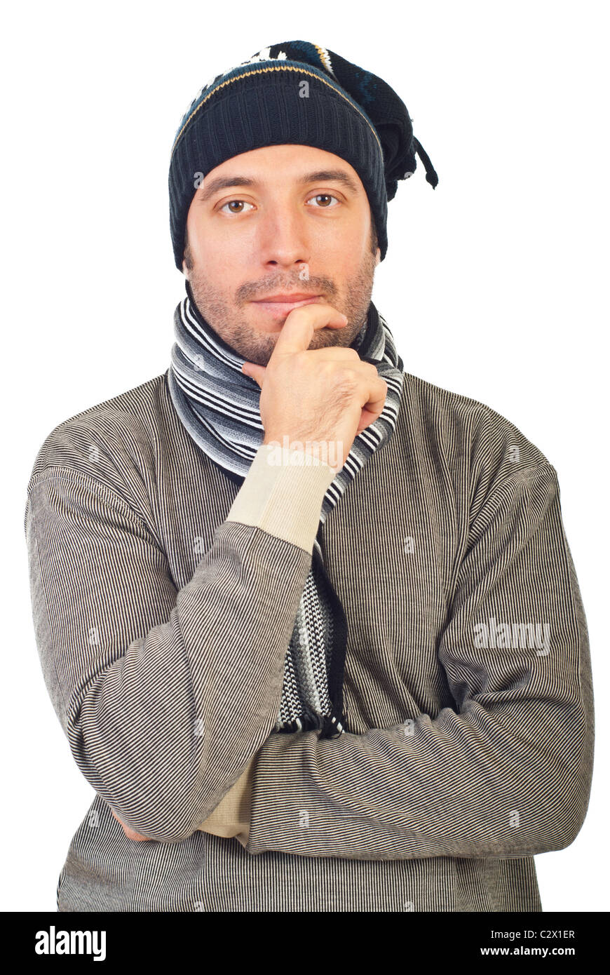 Man with knit cap and scarf thinking and holding hand to chin isolated ...