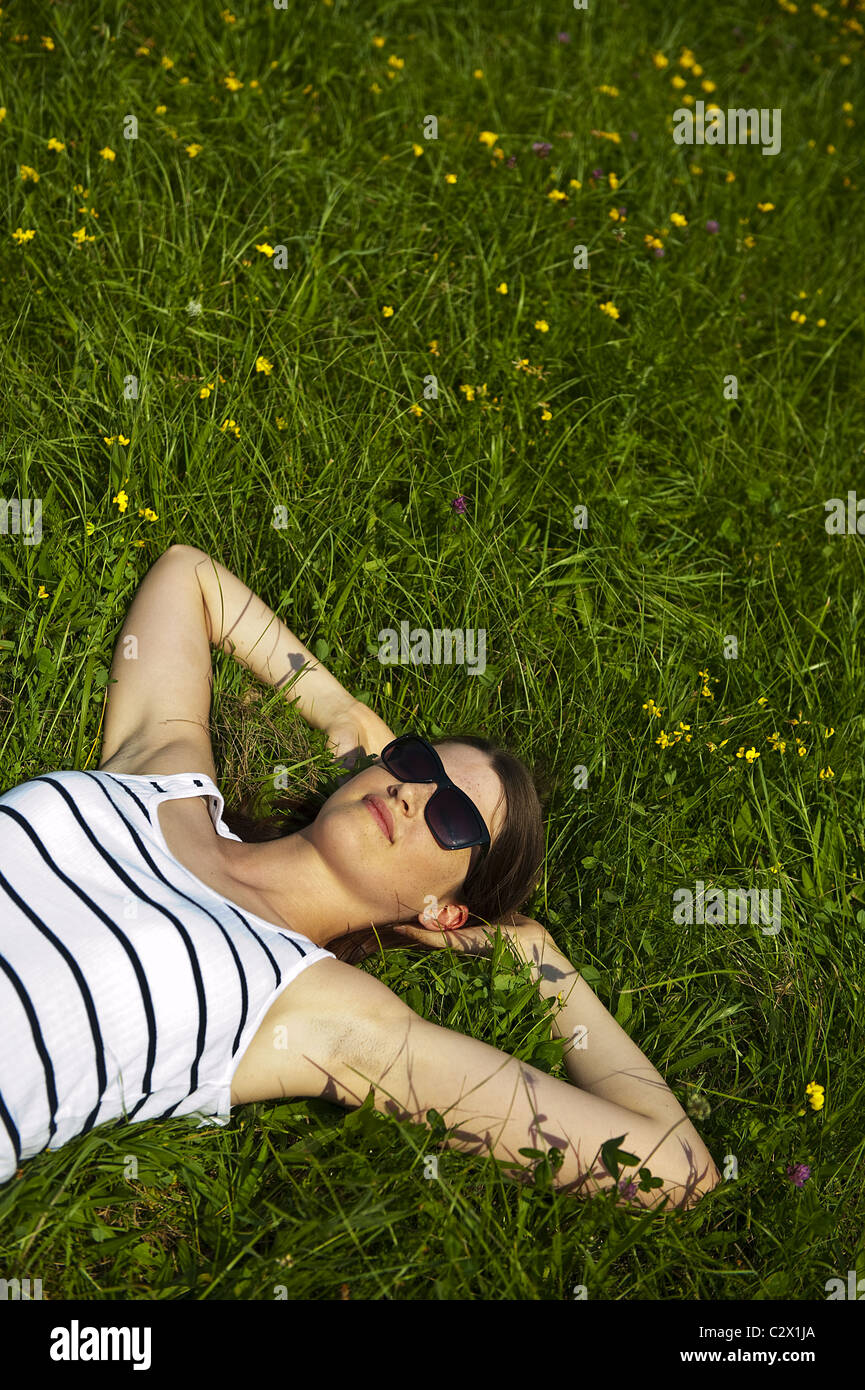 Young woman relaxing Stock Photo - Alamy