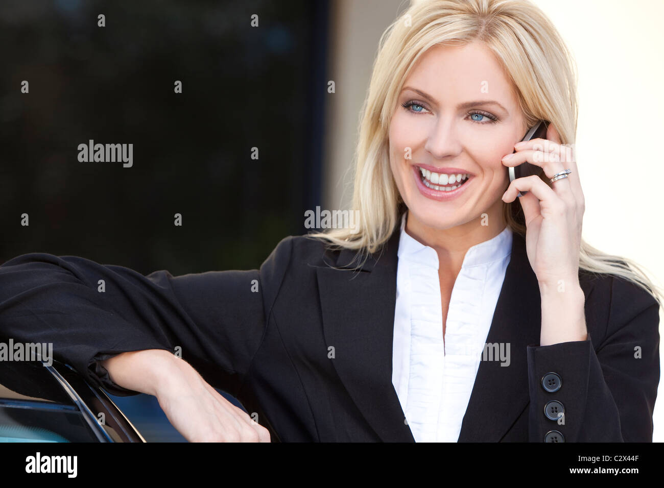 Female executive on mobile hi-res stock photography and images - Alamy