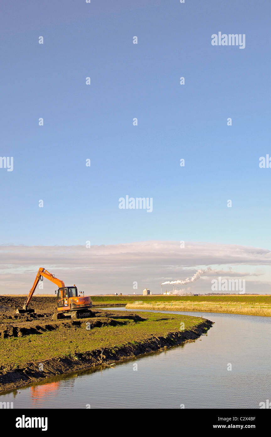 Mechanical Digger dredging canal banks in East Anglia, with Power ...
