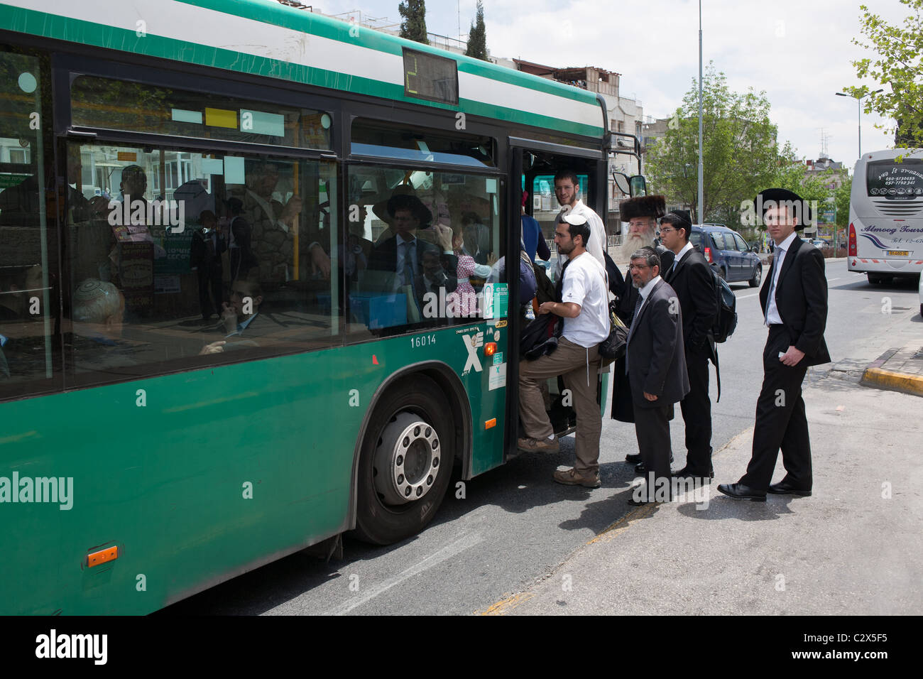 Ultra-Orthodox Haredi men board a public gender-segregated bus through ...