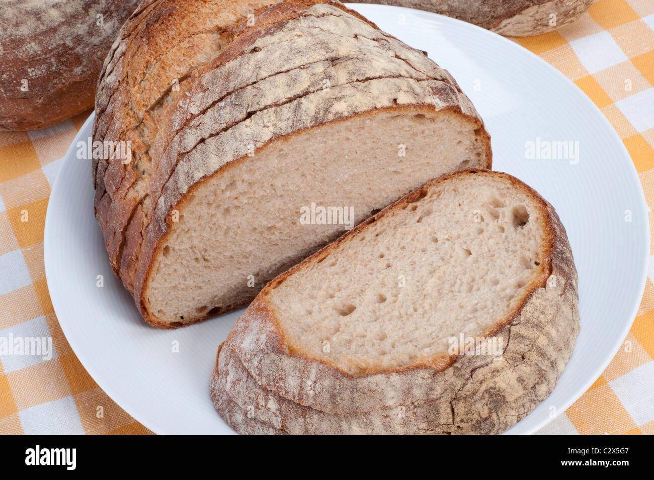 A loaf of sliced sour dough bread Stock Photo - Alamy