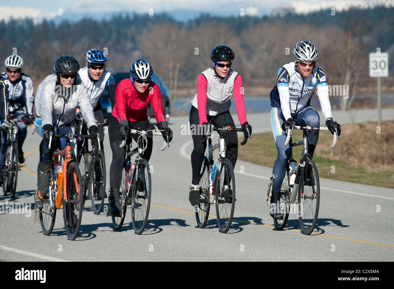 Group of cyclists on the road Stock Photo - Alamy