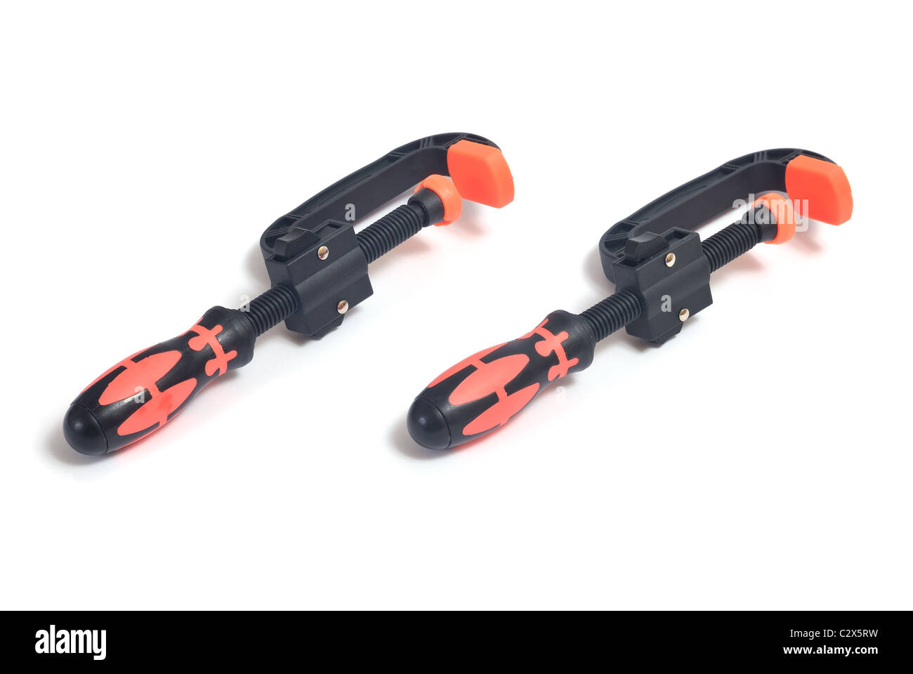 two plastic clips on white Stock Photo - Alamy