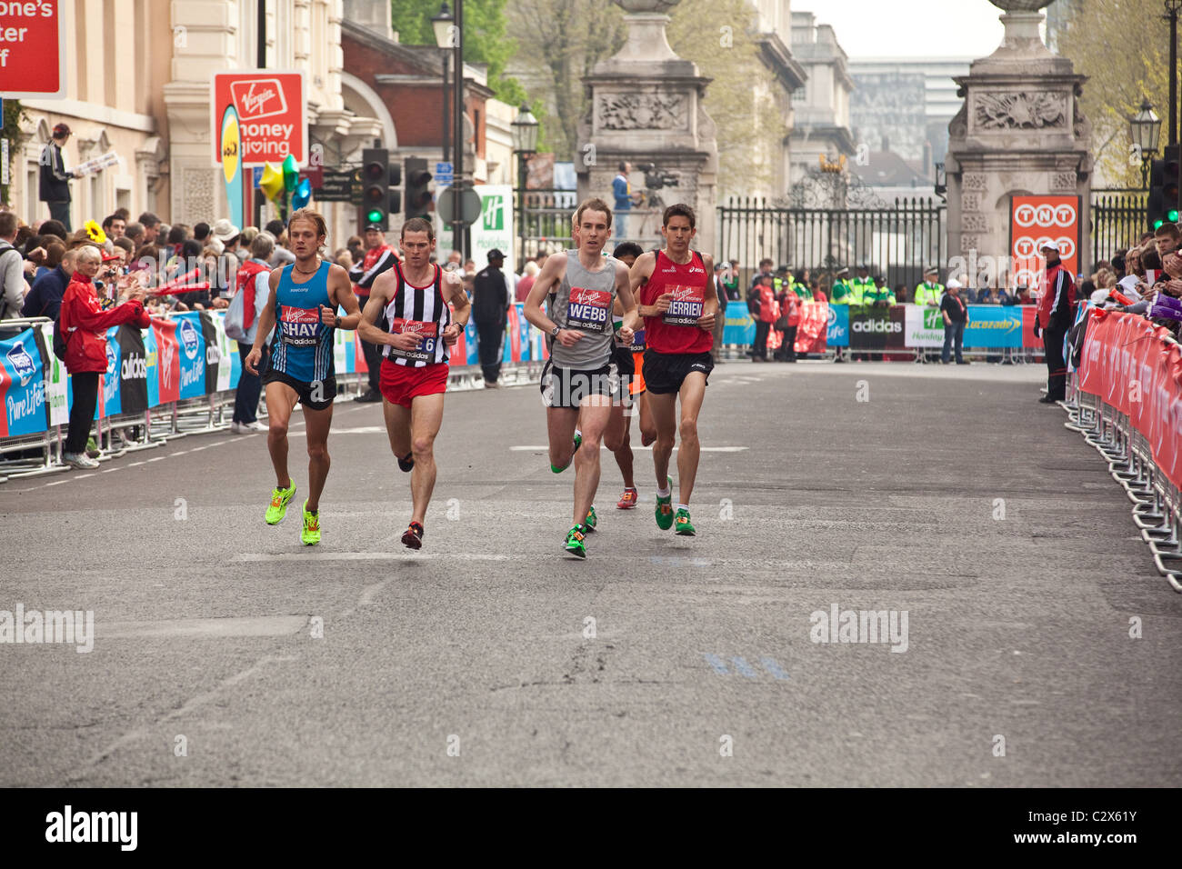 Mens elite runners at the London Marathon 2011,Church Street, Greenwich ...