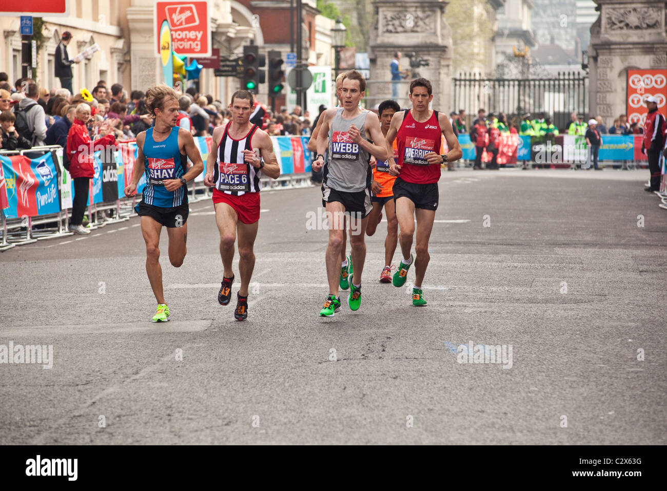 Mens elite runners at the London Marathon 2011,Church Street, Greenwich ...