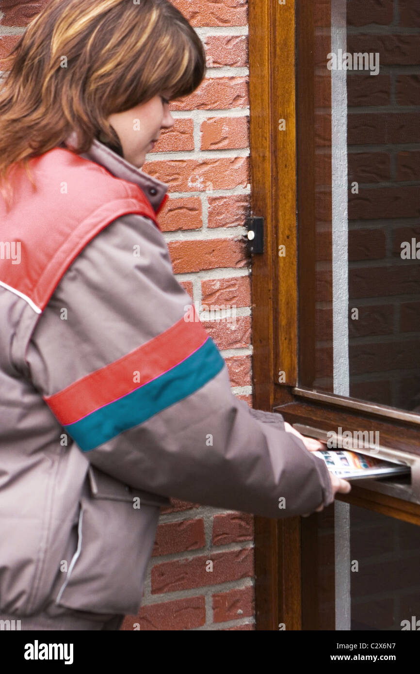 Mail carrier delivering mail hi-res stock photography and images - Alamy