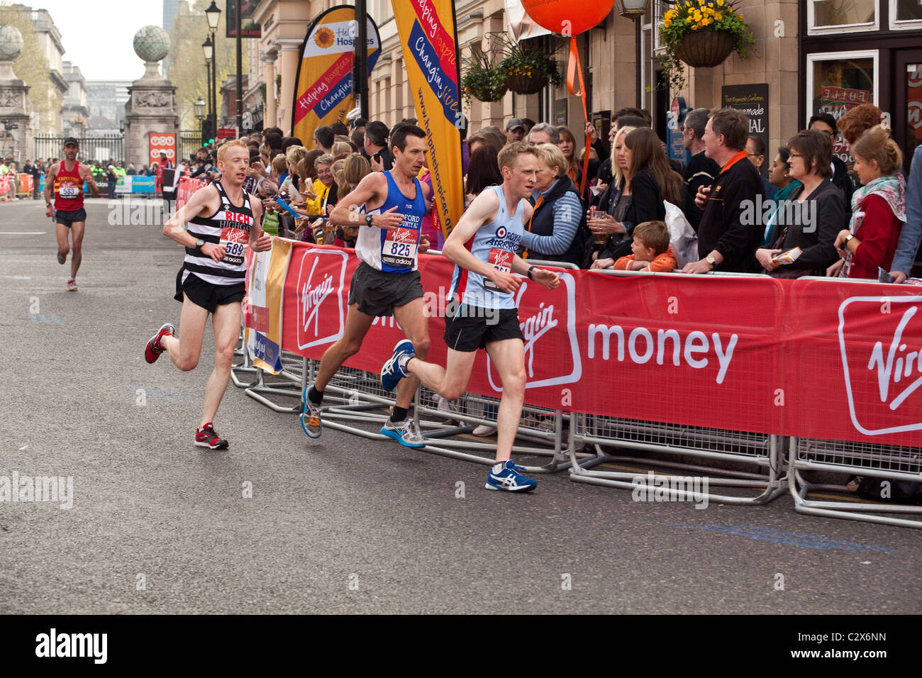 Mens elite runners at the London Marathon 2011,Church Street, Greenwich ...