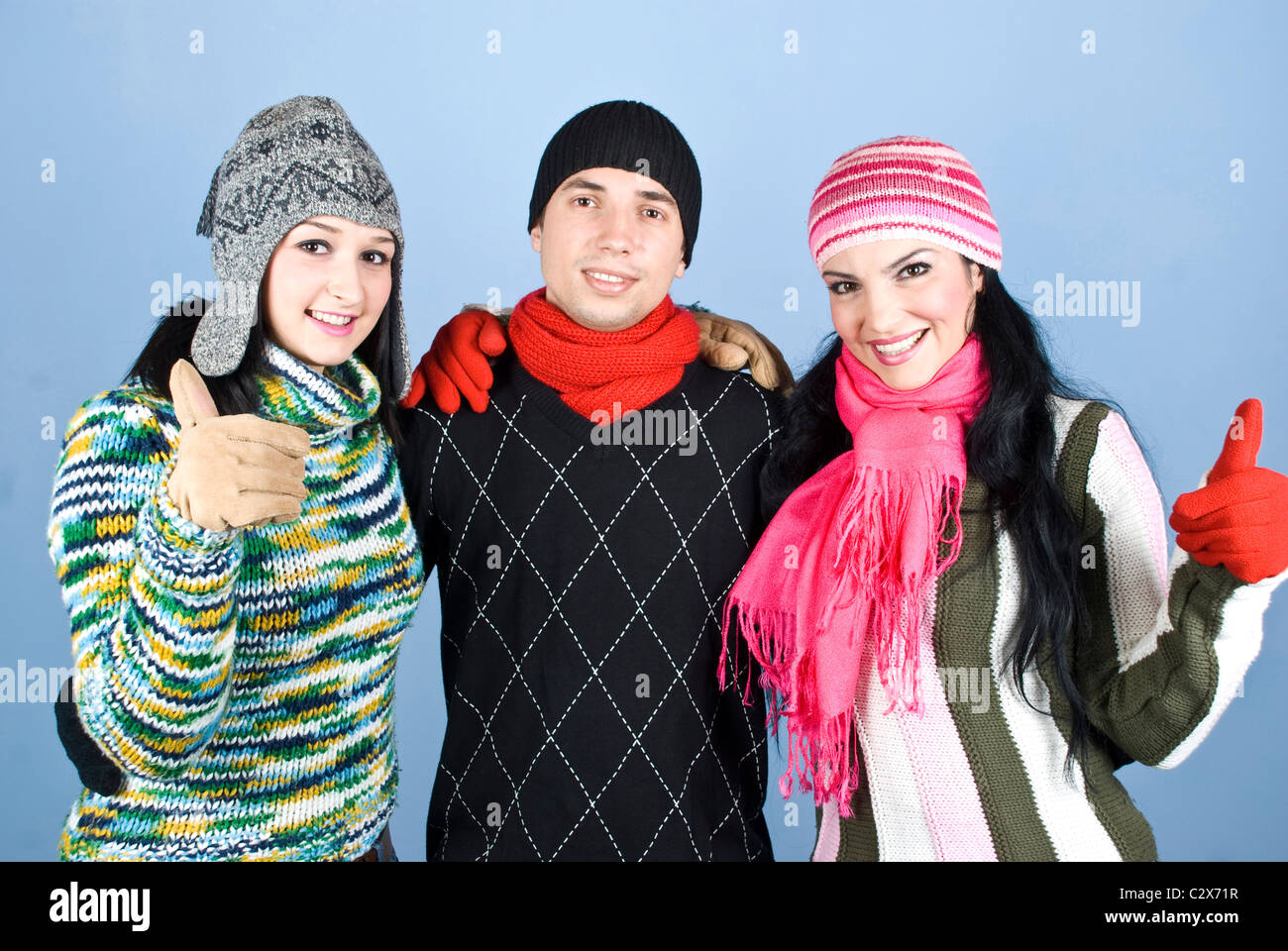Three people friends standing in a line and giving thumbs up ,concept ...
