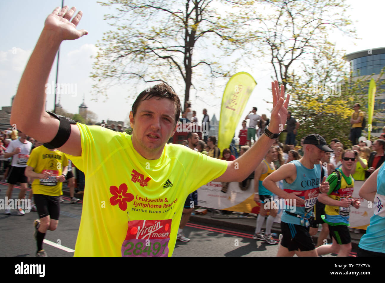 Charity runners in the 2011 Virgin London Marathon Stock Photo - Alamy