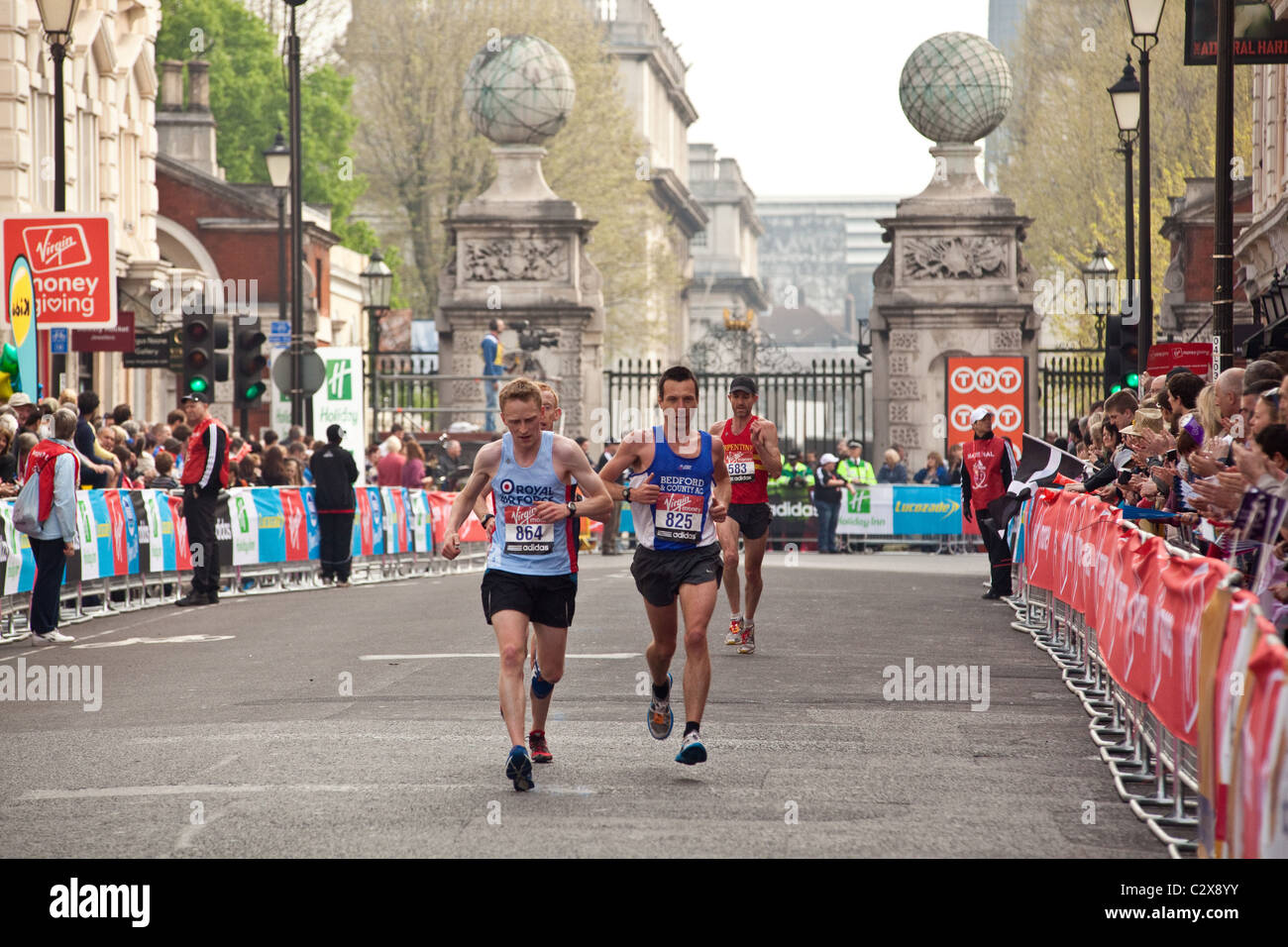Mens elite runners at the London Marathon 2011,Church Street, Greenwich ...