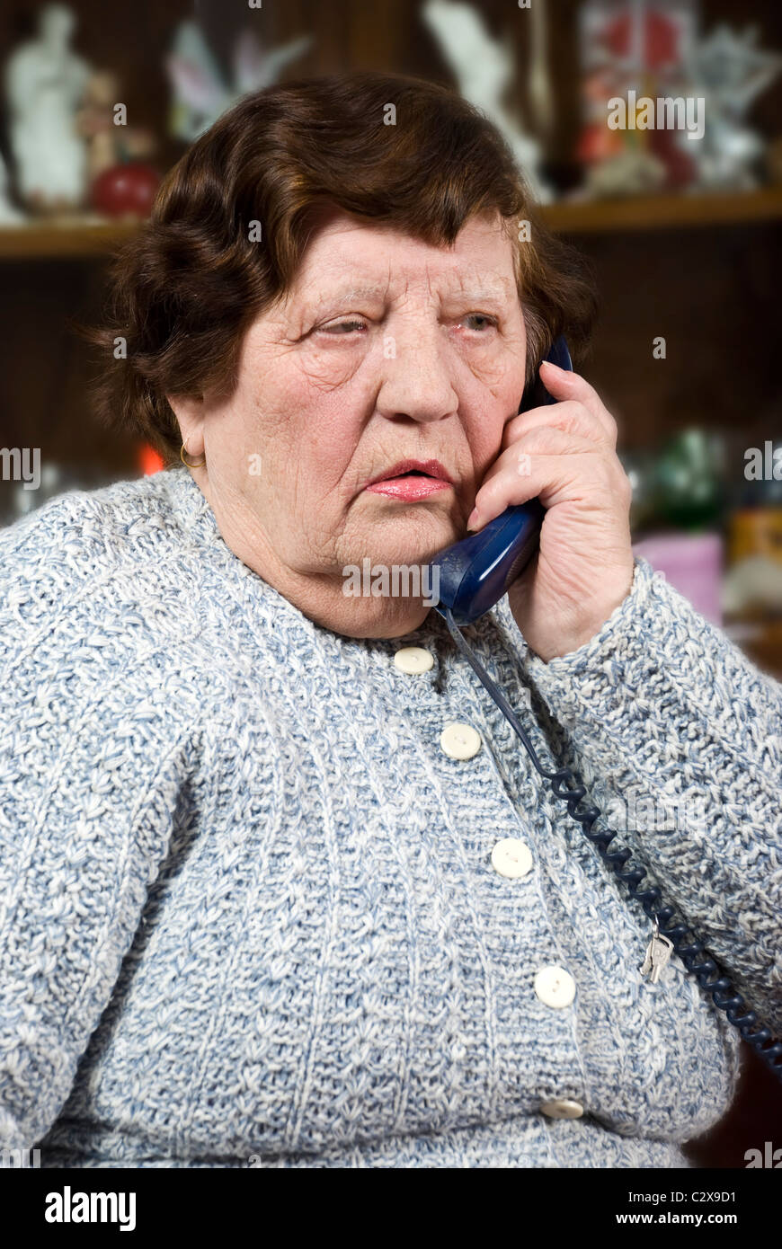 Elderly telephone scared hi-res stock photography and images - Alamy
