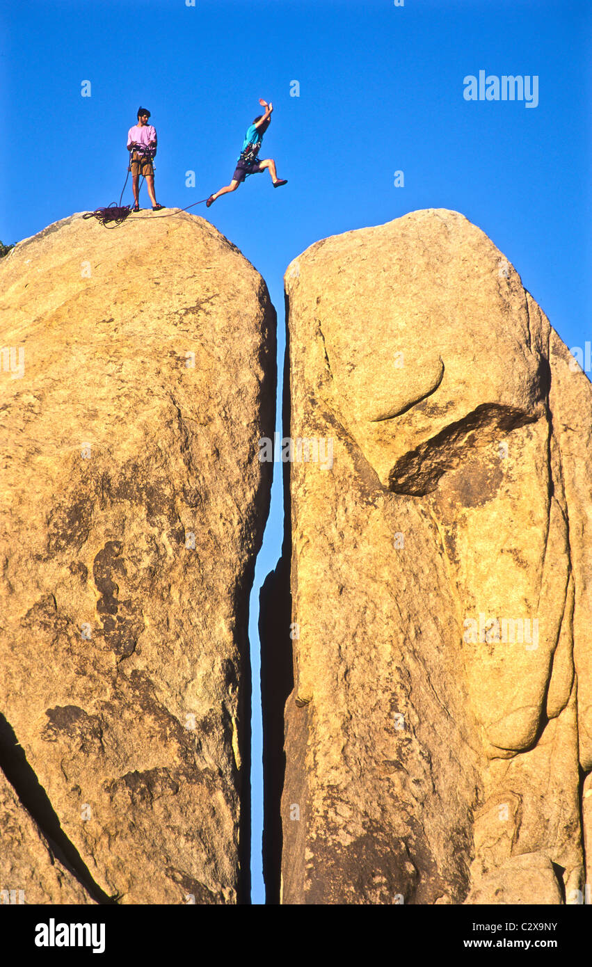 Jump mountain rock leap hi-res stock photography and images - Alamy