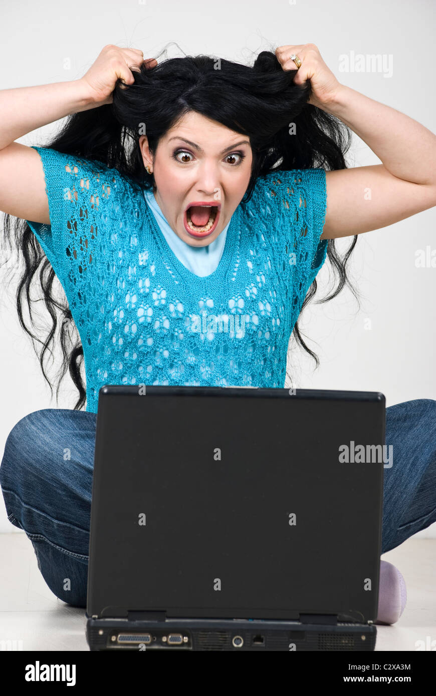 Angry women laptop people home hi-res stock photography and images - Alamy
