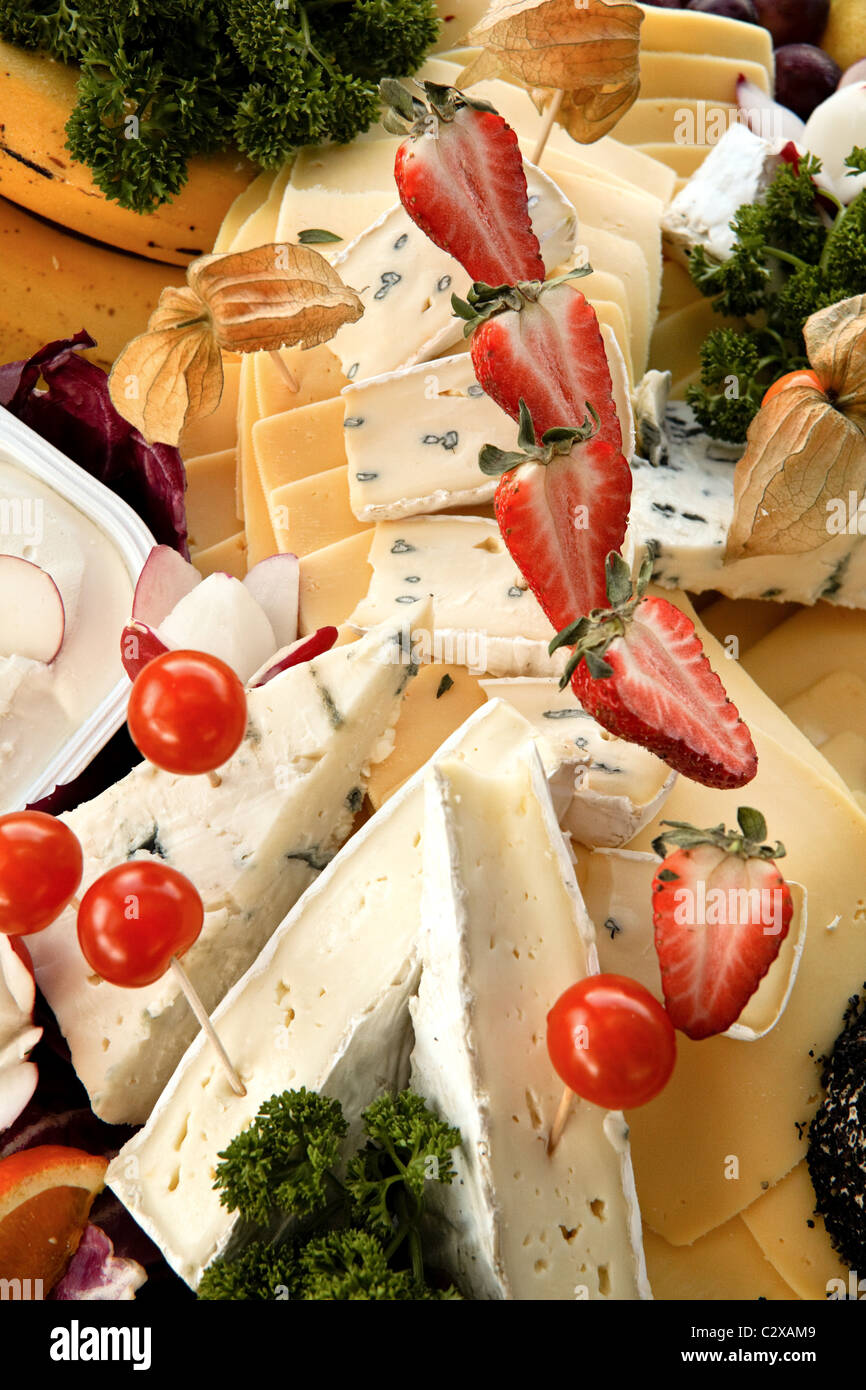 Cheese plate with a cold buffet Stock Photo - Alamy