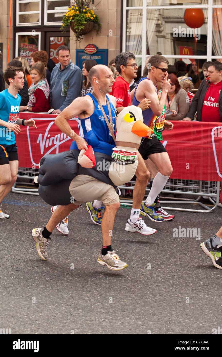 Fancy dress runner at the London marathon 2011,Church street, Greenwich ...