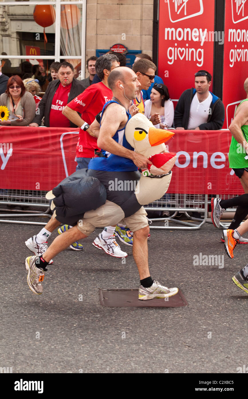 Fancy dress runner at the London marathon 2011,Church street, Greenwich ...
