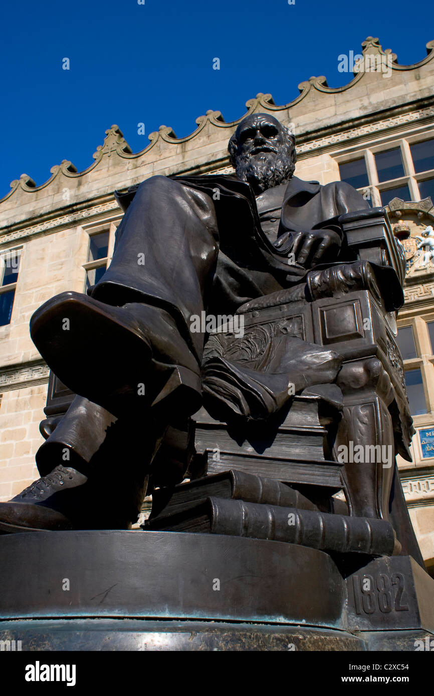 Statue of Charles Darwin and his books in front of the library in ...