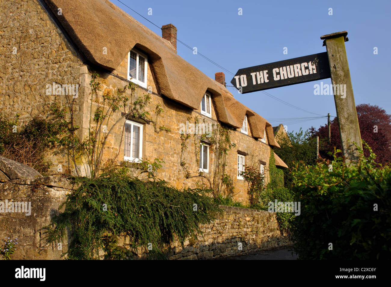 Thatched cottages in Ebrington village, Gloucestershire, England, UK ...