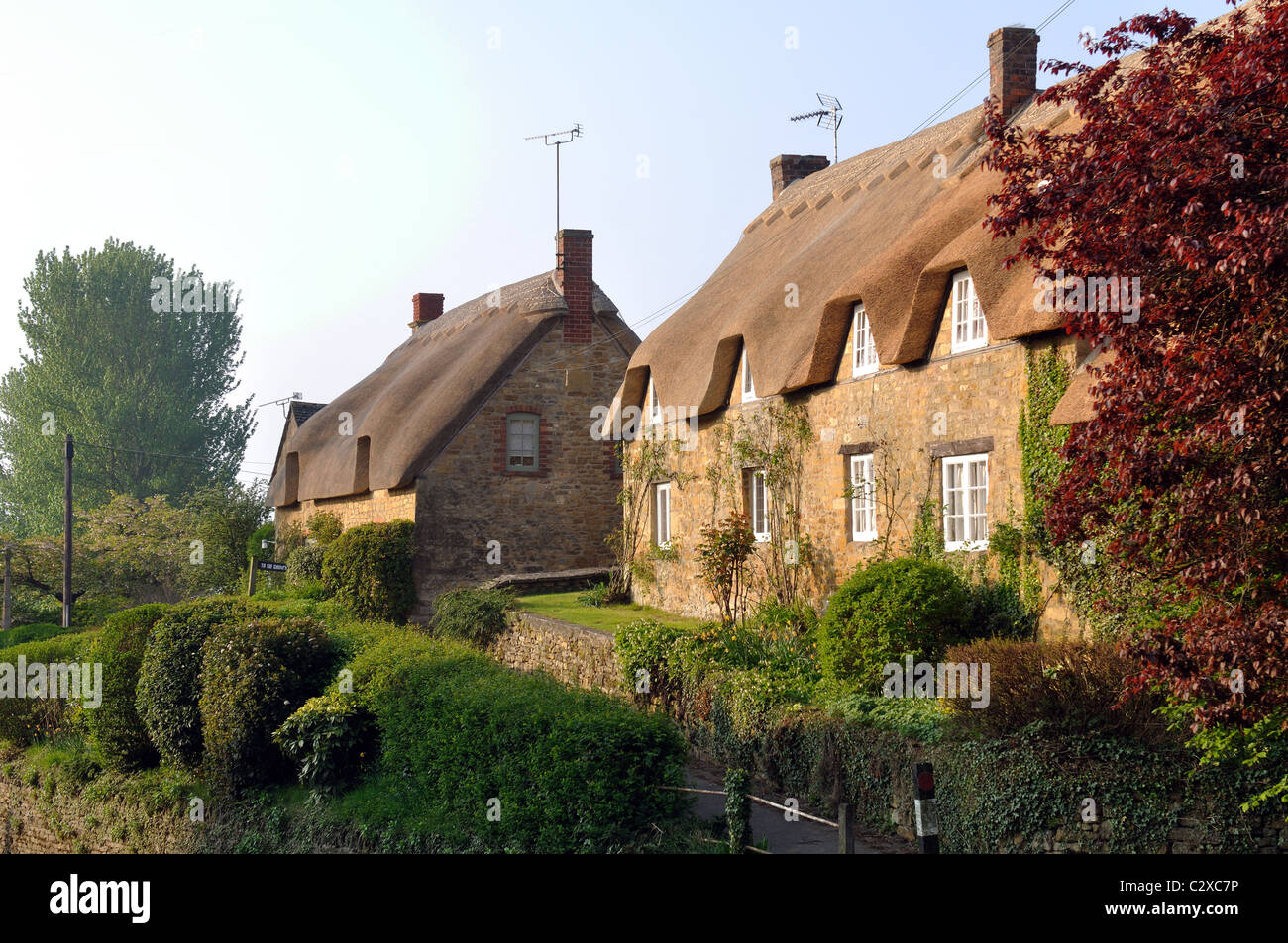 Thatched cottages in Ebrington village, Gloucestershire, England, UK ...