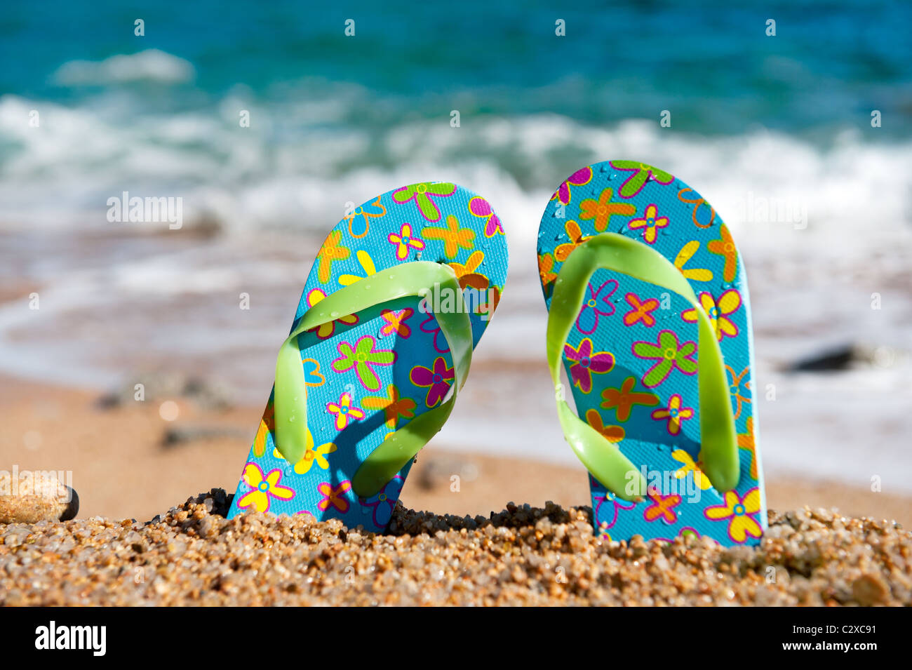 Flip flops at the beach Stock Photo - Alamy