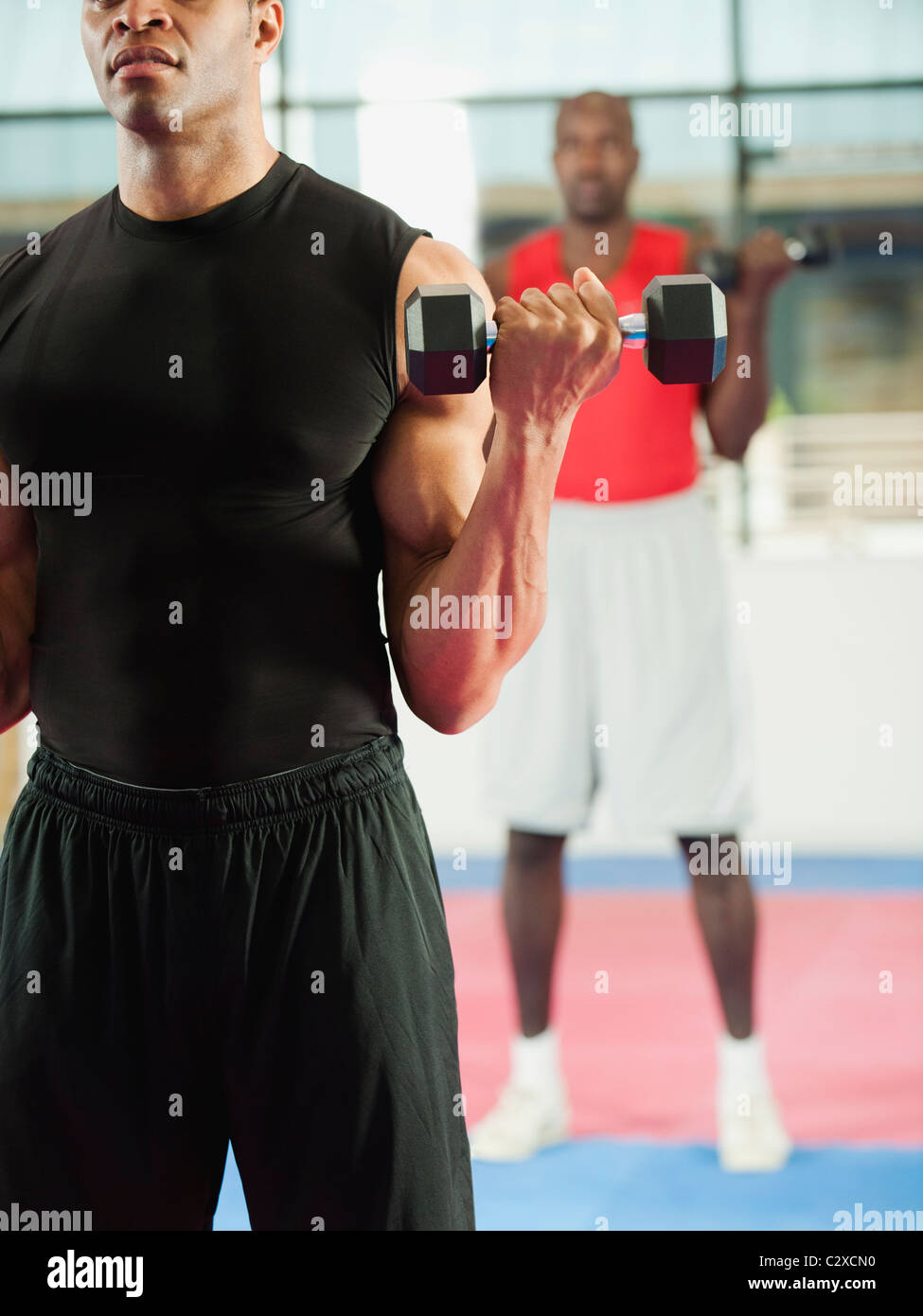 Two men exercising in gymnasium hi-res stock photography and images - Alamy