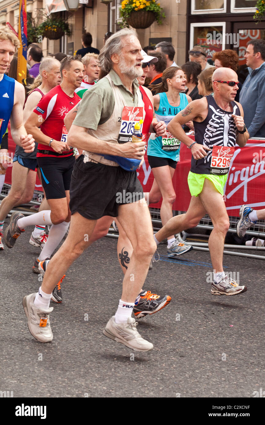 Fancy dress runner at the London marathon 2011,Church street, Greenwich ...