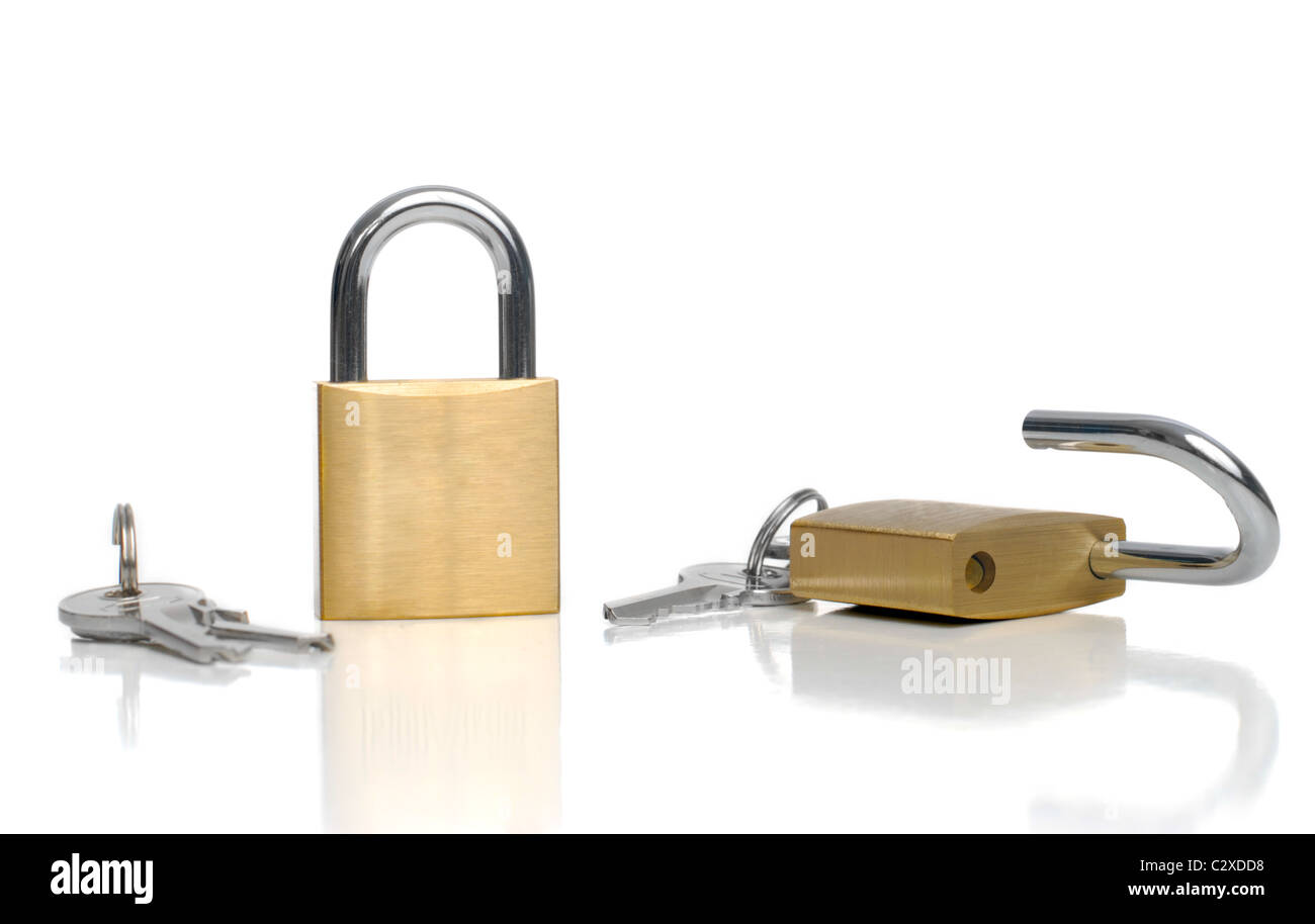 Two security gold locks and keys on white background Stock Photo - Alamy