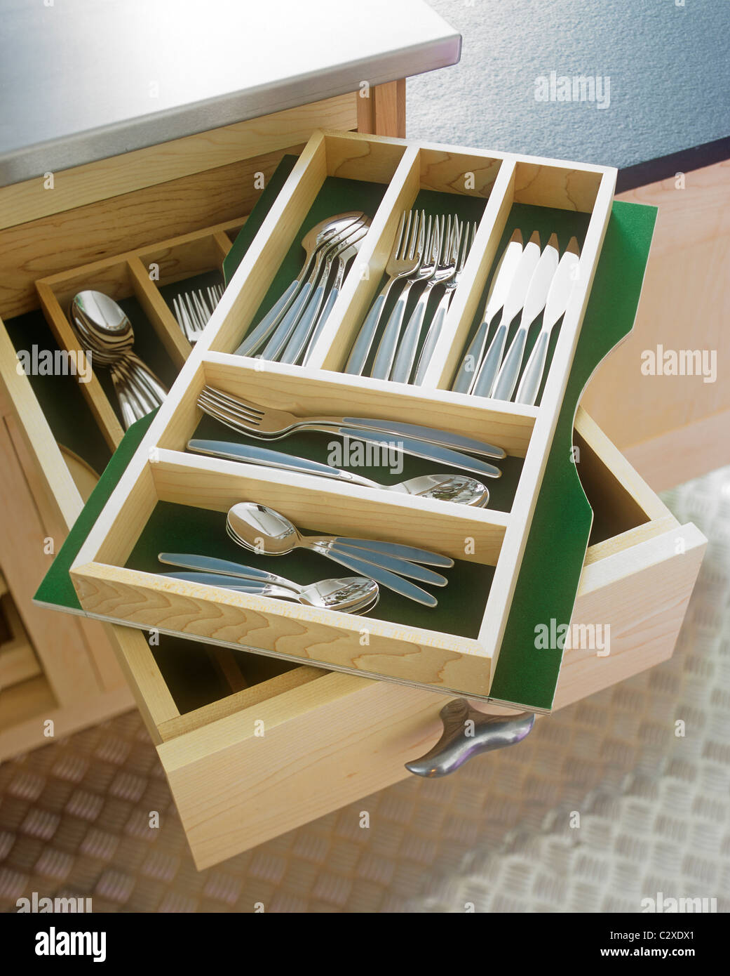 modern kitchen, showing an open cutlery drawer Stock Photo - Alamy