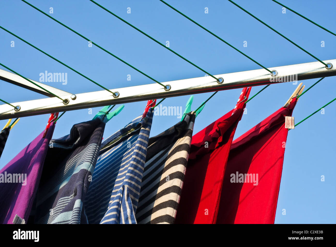 Clothes hanging on a washing line Stock Photo - Alamy