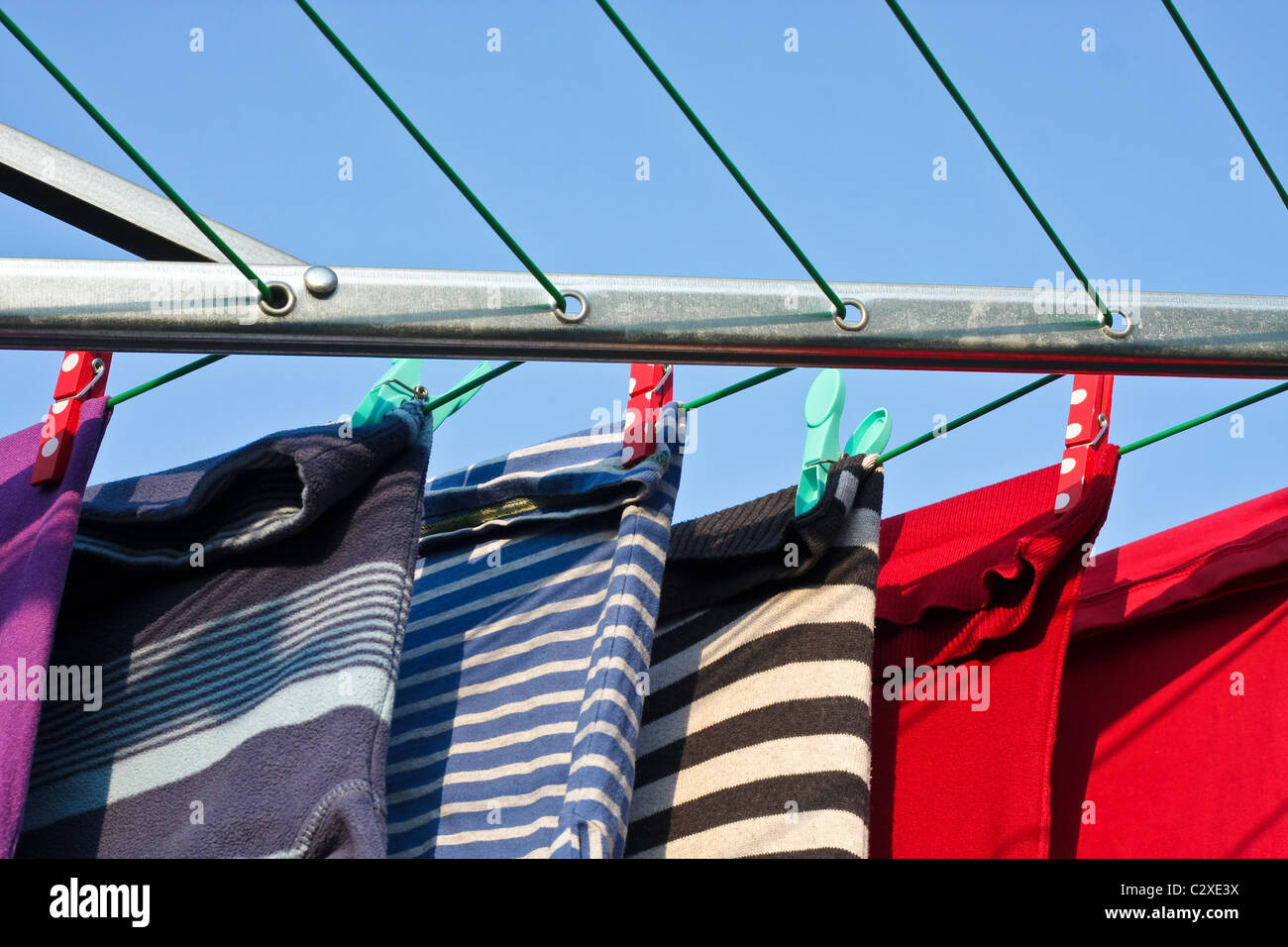 Clothes hanging on a washing line Stock Photo - Alamy